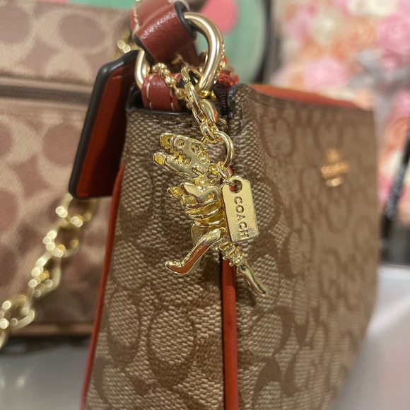 Coach | Accessories | Coach Metallic Gold Dinosaur Charm | Poshmark